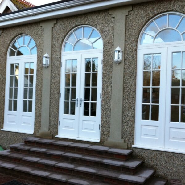 Timber round top arched windows and doors - Medina Joinery