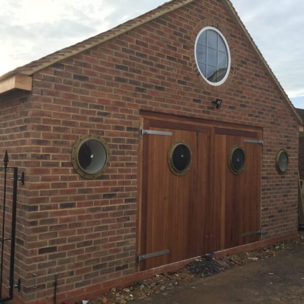 Timber round top arched windows and doors - Medina Joinery